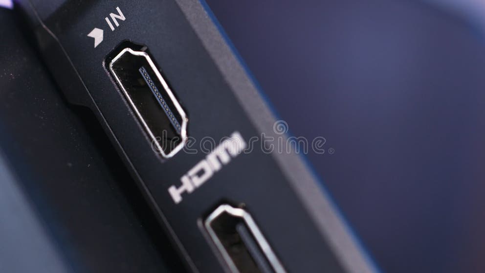 Close Up of the External Power and HDMI Connector. Action. Side View of ...