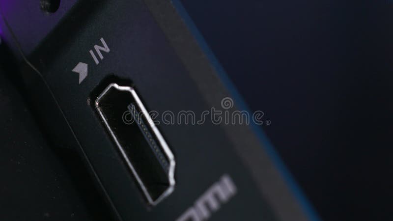 Close Up of the External Power and HDMI Connector. Action. Side View of ...