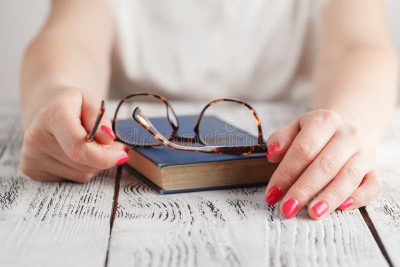 Close Up of Eye Glasses on Text Book in Library. Education Concept ...