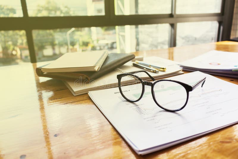 Close Up of Eye Glasses on Work Desk with Chart Stock Image - Image of ...