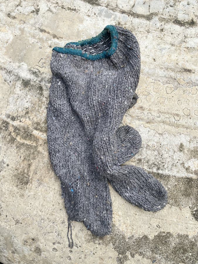 Fabric glove on the ground stock image. Image of fabric - 258525035