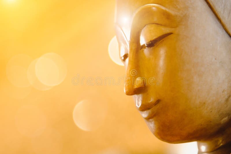 Close Up Face on Buddha Head Statue with Lighting Effect. Stock Image ...