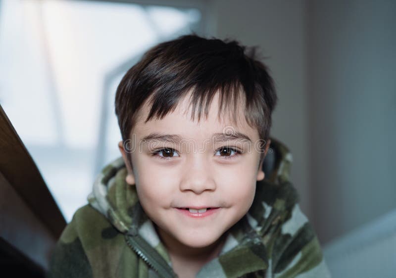 Close Up Face Happy Kid Boy Looking at Camera with Smiling Face ... Close Up Face Happy Kid Boy Looking at Camera with Smiling Face ...