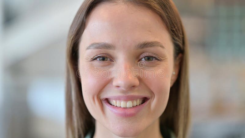 Close Up of Face of Happy Young Woman Smiling at Camera Stock Photo ...