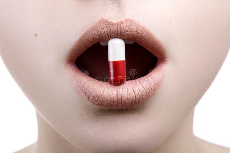 Close Up of a Face with the Red White Pill Medicine in Her Mouth Stock ...