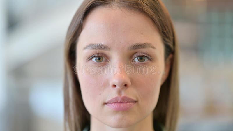 Close Up of Face of Serious Young Woman Looking at the Camera Stock ...