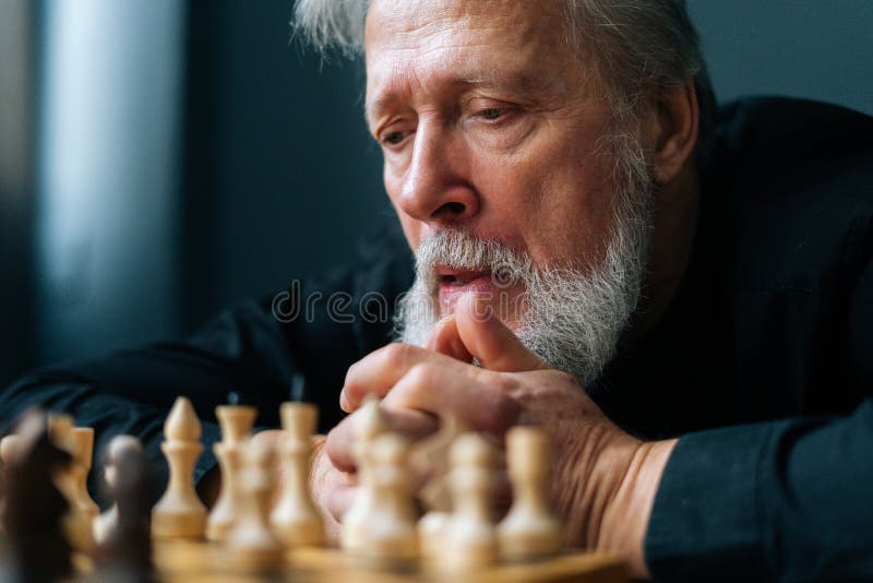 Close-up Face of Thoughtful Gray-haired Senior Older Man Thinking Game ...