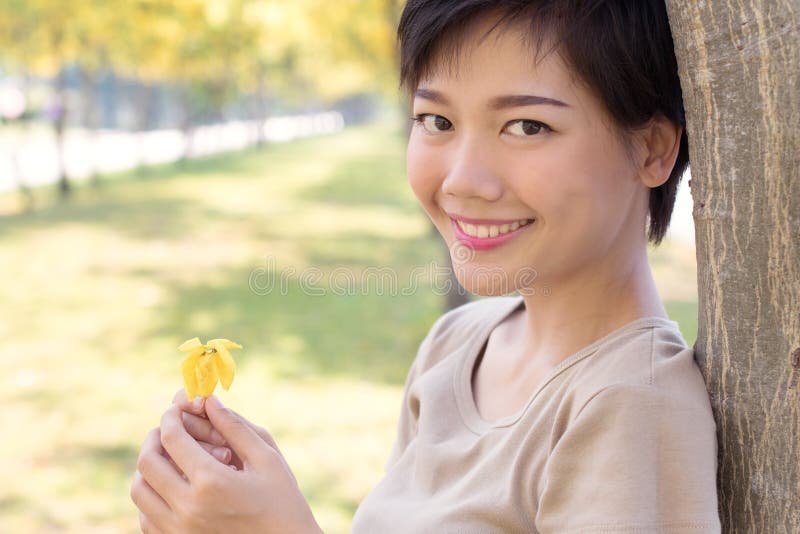 Close Up Face Of Young Asian Woman With Smiling Face And Relaxin Stock ... Close Up Face Of Young Asian Woman With Smiling Face And Relaxin Stock ...