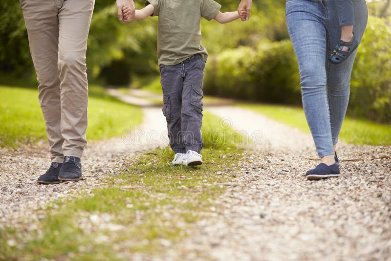 Close Up of Family Going for Walk in Summer Countryside Stock Photo ...