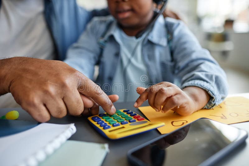 Close Up of Father and Child Playing with Toy Calculator Stock Photo ...
