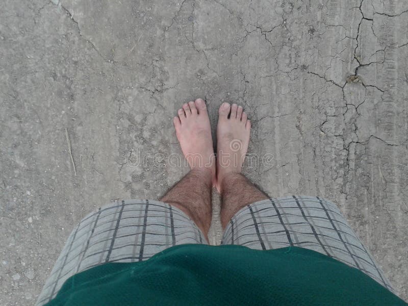 Feet on the ground stock photo. Image of person, shoes - 298148584