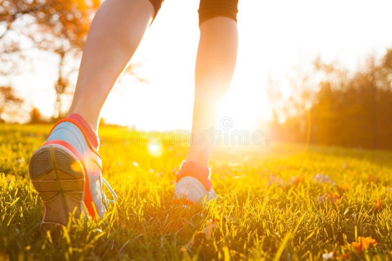 Close Up of Feet of a Runner Running in Grass Stock Image - Image of ...