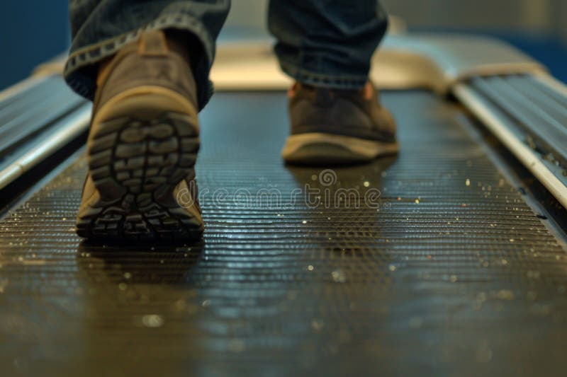 Closeup of Feet Stepping on a Treadmill Beginning of a Cardio Workout ...