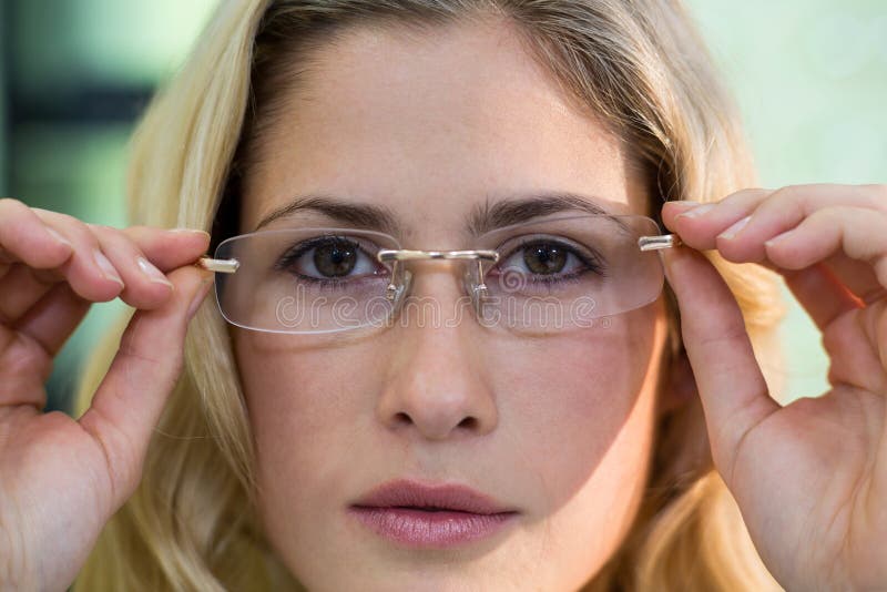 Close-up of Female Customer Trying Spectacles Stock Image - Image of ...