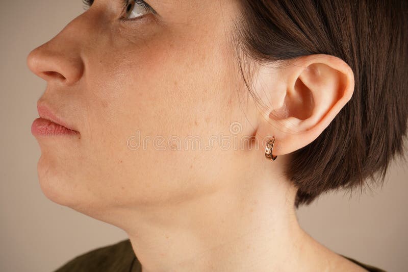 Close-up of a Female Ear with Brown Hair. Stock Image - Image of ...