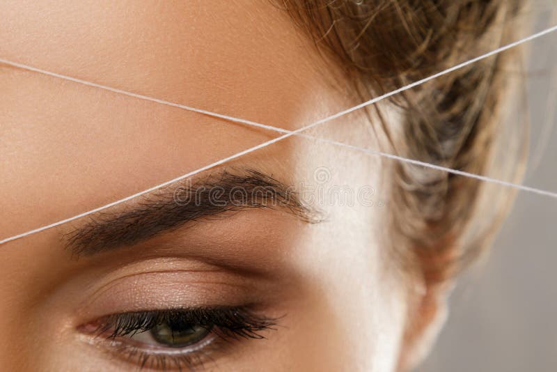 Eyebrow Threading - Epilation Procedure for Brow Shape Correction Stock ...