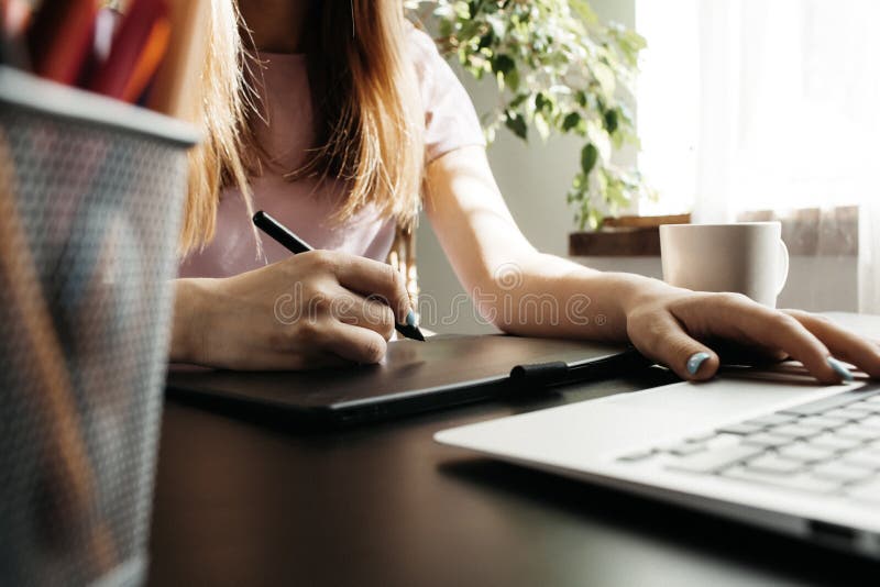 Close Up of Female Graphic Designer Drawing Sketches on Graphic Tablet ...