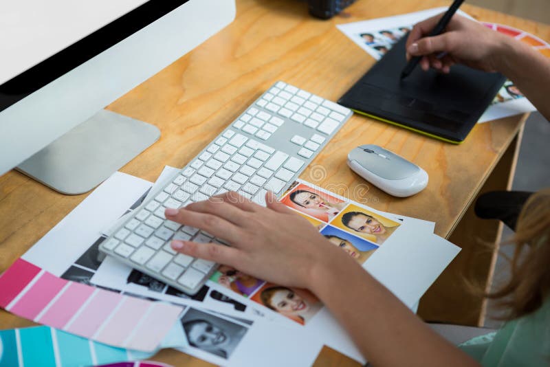 Close-up of Female Graphic Designer Working at Desk Stock Image - Image ...