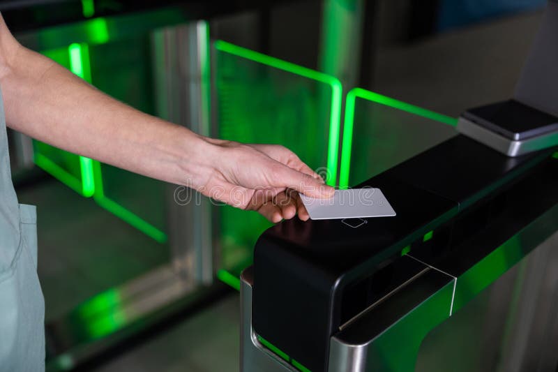 Close Up of a Female Hand with an Access Card on the Security Control ...