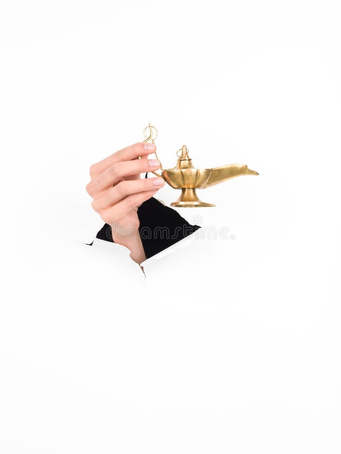 Female Hand Holding a Magic Lamp Stock Image - Image of cracker ...