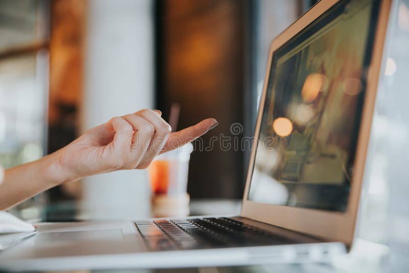 Close Up of Female Hand Pointing Finger To Laptop Screen Stock Photo ...
