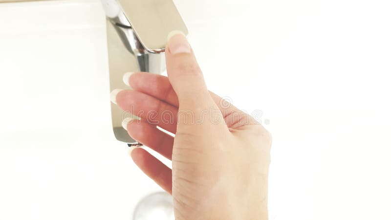 Close-up Female Hand Uses a Water Tap. Stock Photo - Image of closeup ...