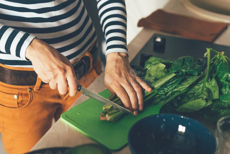 Close Up of Hands Cutting Spinach Stock Photo - Image of healthy, human ...