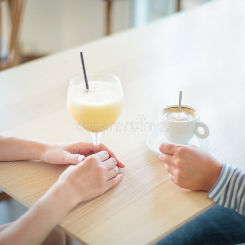 Close-up of Female Hands while Drinking Coffee and Smoothie Stock Image ...
