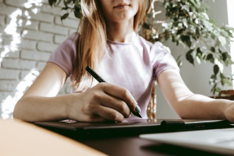 Close Up of Female Graphic Designer Drawing Sketches on Graphic Tablet ...