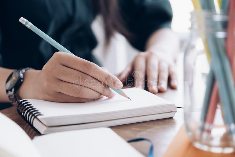 Close Up Female Hands with Pen Writing on Notebook Stock Photo - Image ...
