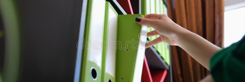 Female Hands Taking Off Folder with Documents from Shelf Stock Image ...