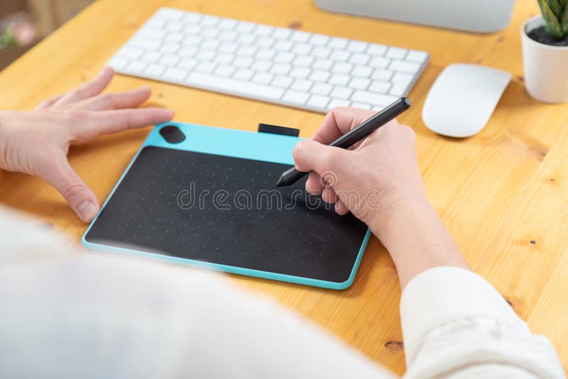 Hand of Graphic Designer Working with Stilus and Tablet Stock Photo ...