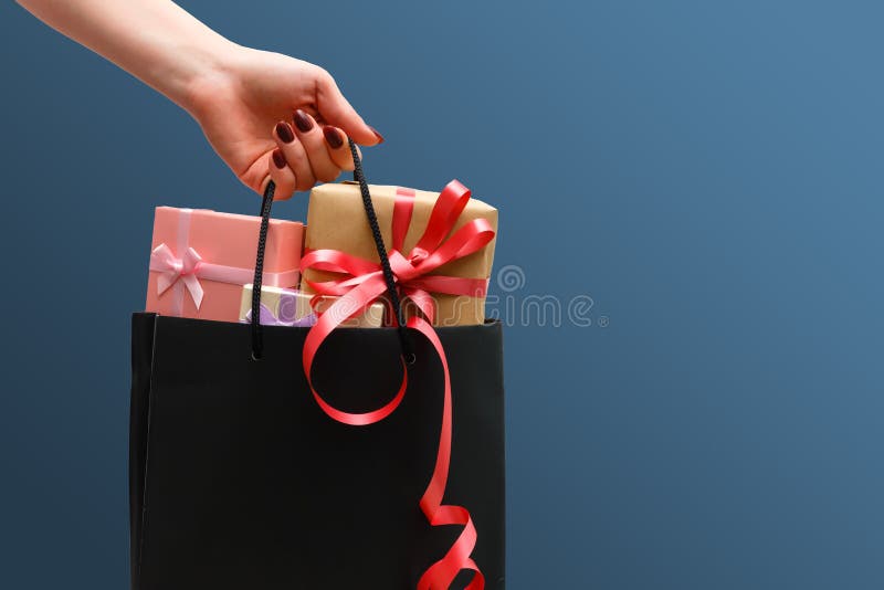 Close Up Female Holds in Hand Package of Gifts Stock Image - Image of ...