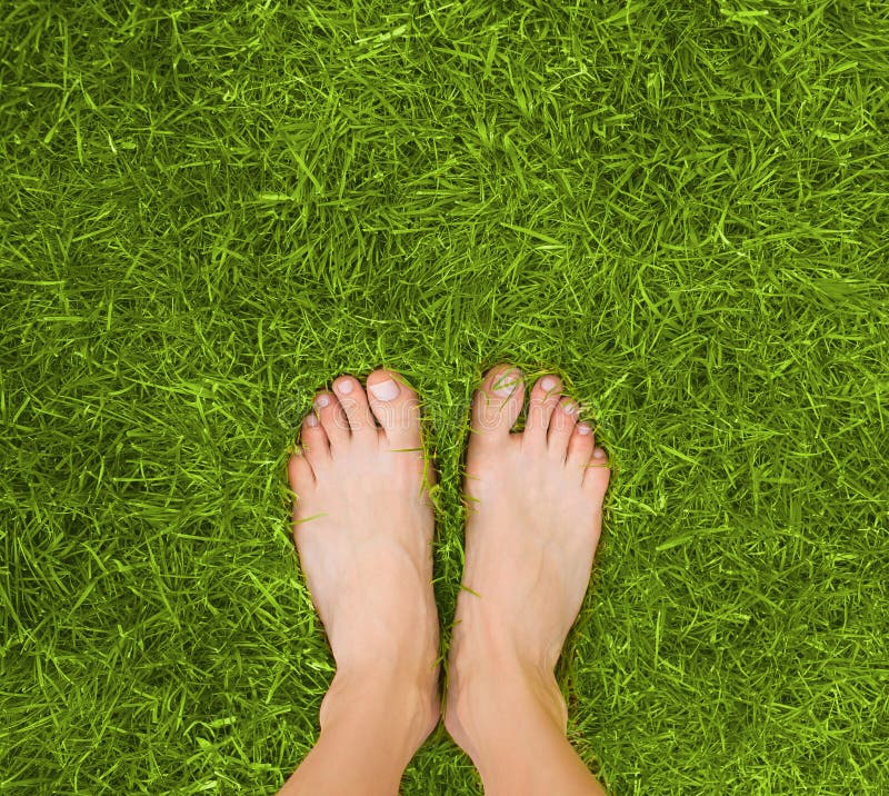 Close Up Female And Child Legs Lying On The Grass. Stock Photo - Image ...