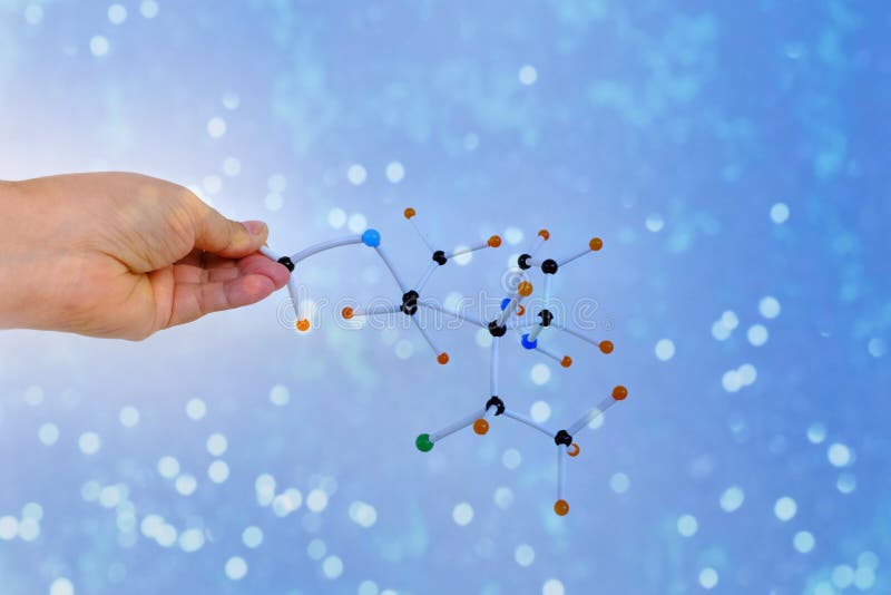 Close-up of Female Scientist`s Hands Holding of Molecules and Atoms in ...