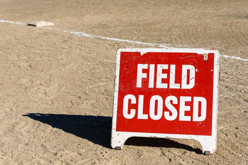 Close Up of Field Closed Sign on Empty Local Baseball Field, Third Base ...