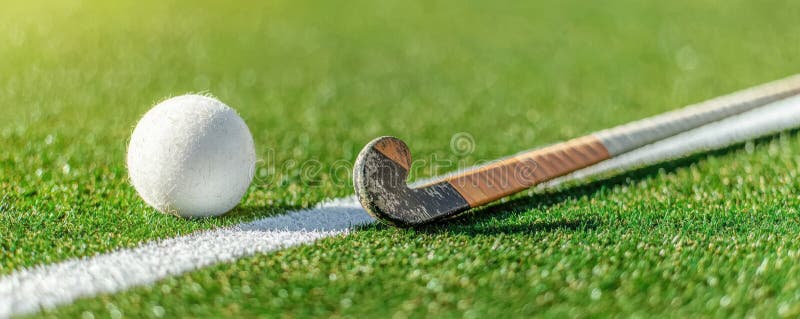 Close-up of a Field Hockey Stick and Ball on the Edge of the Line ...