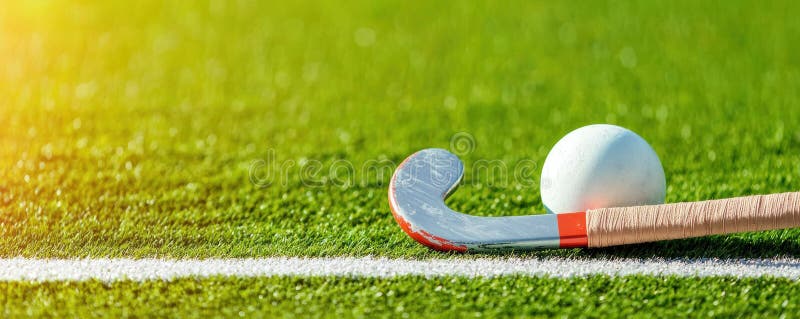 Close-up of a Field Hockey Stick and Ball on the Edge of the Line ...