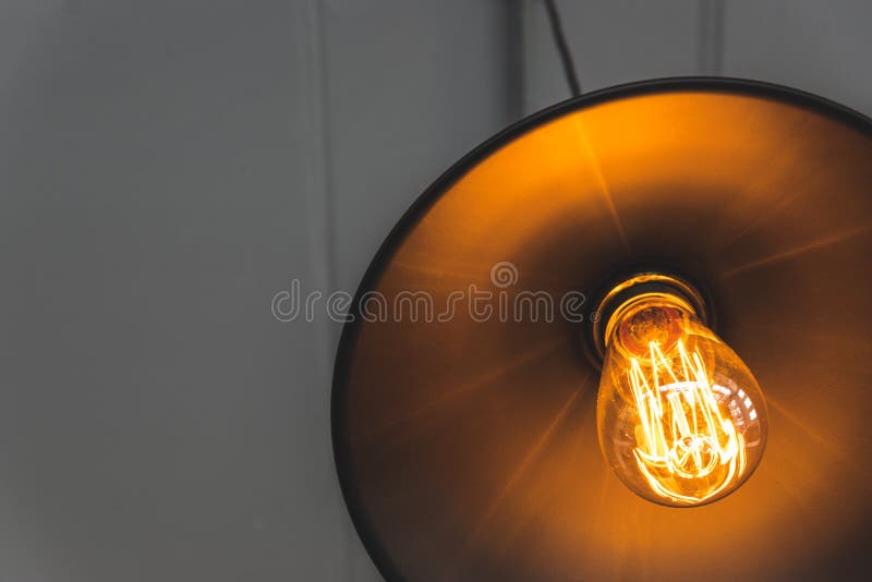 Filament Inside Warm Light Bulb Stock Photo - Image of incandescence ...