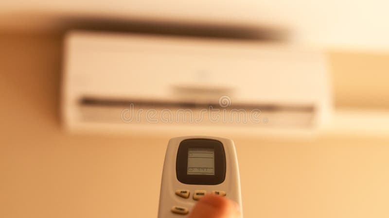 Close Up of Finger on Air Conditioner Remote Control Stock Image ...