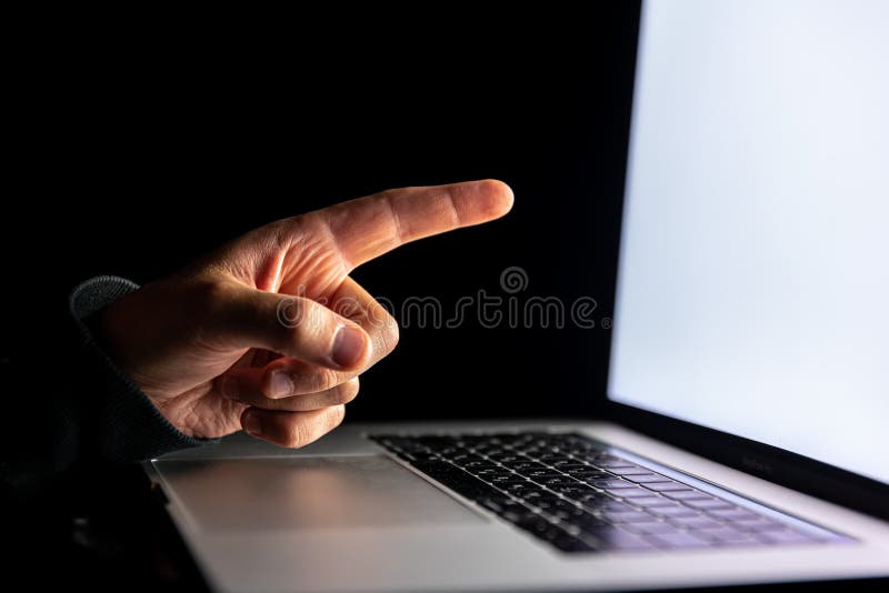 Close-up of a Finger Points To a Laptop Screen Stock Image - Image of ...