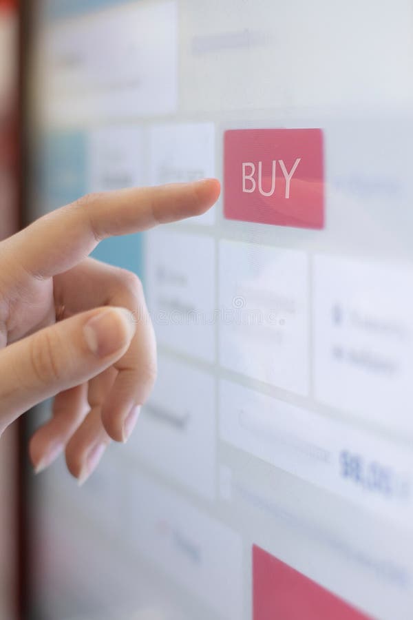 Close-up Finger Presses the BUY Button on the Touchscreen Stock Photo ...