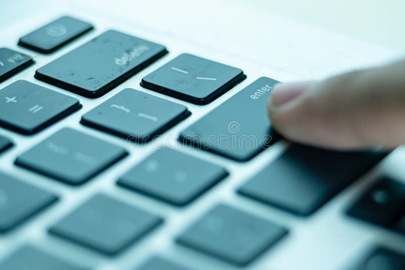Close-Up of Enter Key on a Black Keyboard in Low Light Stock Photo ...