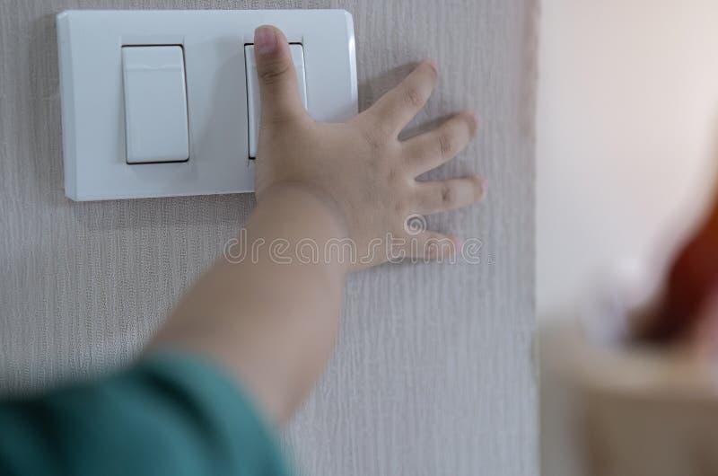 Close Up Finger’s Kid is Turning on or Turning Off the Light-switch ... Close Up Finger’s Kid is Turning on or Turning Off the Light-switch ...