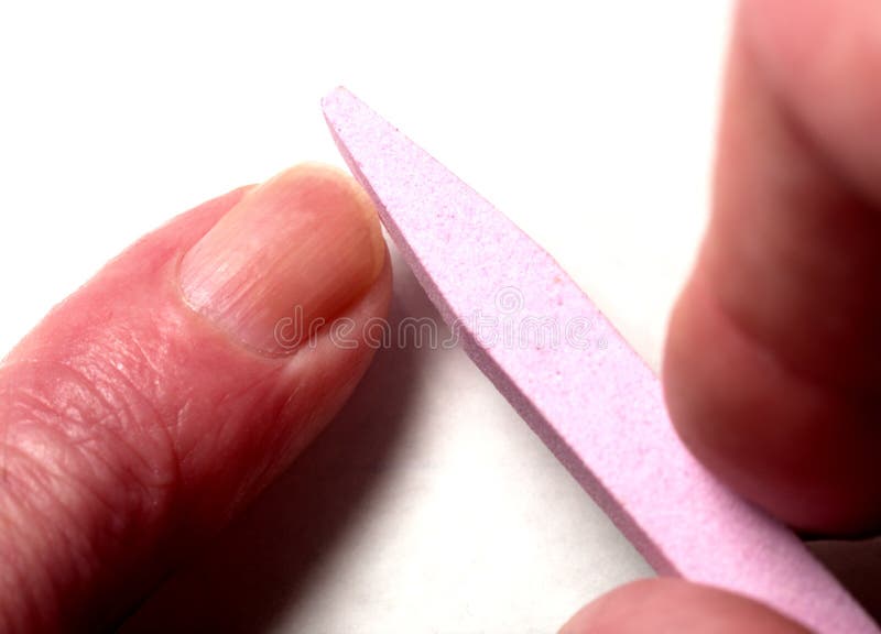 Filing a fingernail stock image. Image of finger, authentic - 222957421