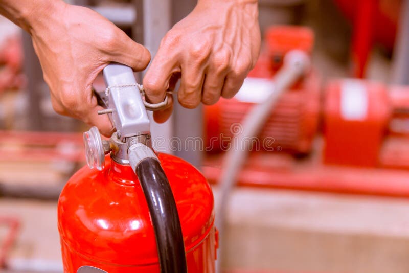 Close Up Fire Extinguisher and Pulling Pin on Red Tank Stock Photo ...