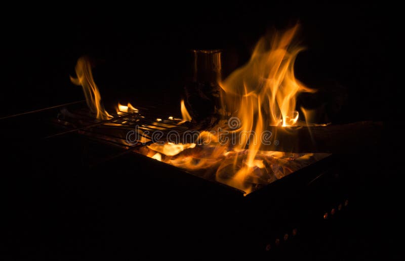 Close-up: Fire Flames in the Outdoors Grill Box for Barbeque with a ...