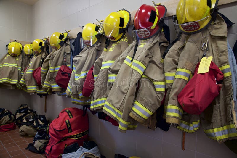 Close-up of Firefighters Clothing and Helmet on a Clothes Rack ...