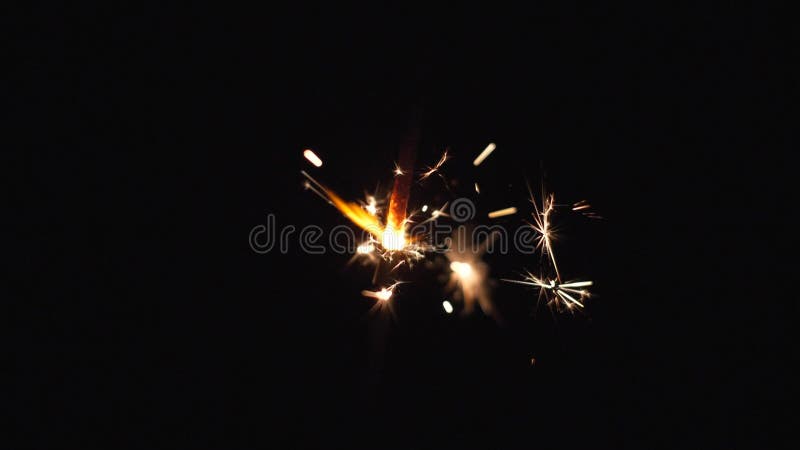 Close-up of Firework Sparkler Burning. Fireworks Burn on a Black ...