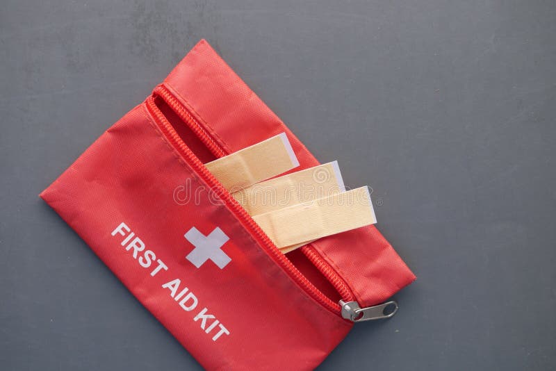 Close Up of First Aid Kit on Black Background Stock Image - Image of ...